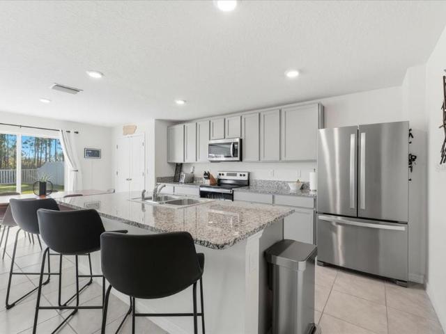 1211 Tahitian Sunrise Dr, Plant City, FL 33565 | MLS #L4958 | Compass