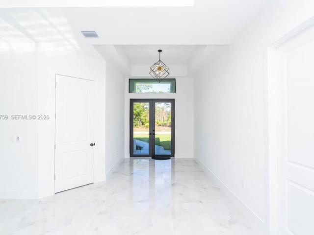 121 Moore Ave, Lehigh Acres, FL 33936 | MLS #A11988 | Compass