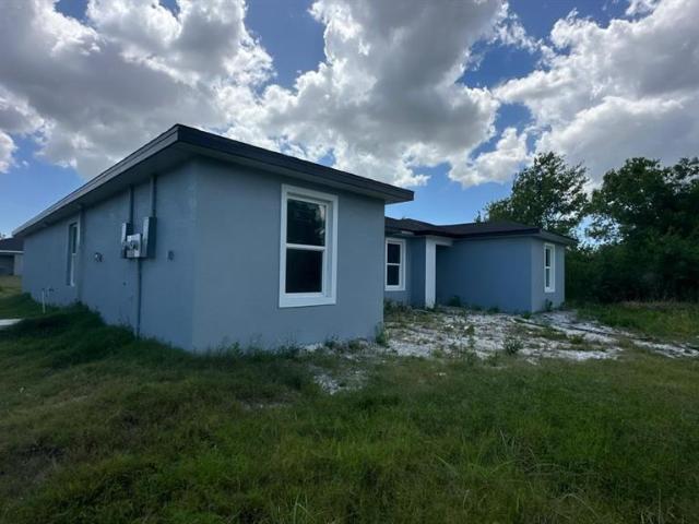 12223 Kirk Ave, Port Charlotte, FL 33981 | MLS #TB8429 | Compass