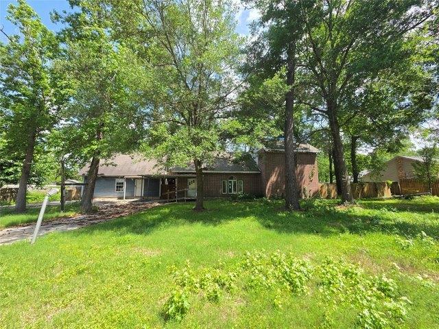 12222 Oak Hollow Ln, Pinehurst, TX 77362