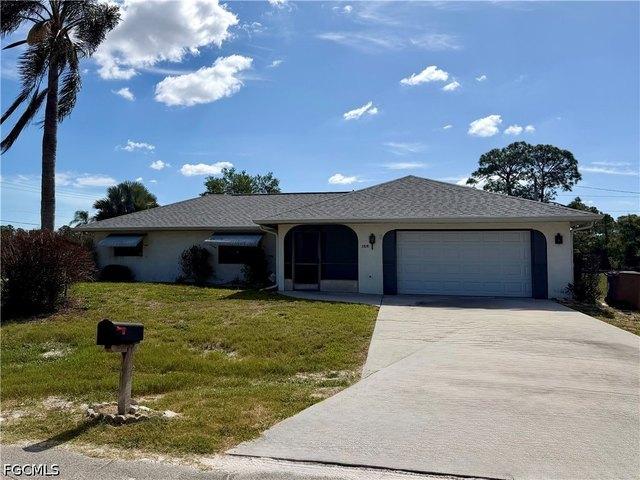 122 Roosevelt Ave, Lehigh Acres, FL 33936