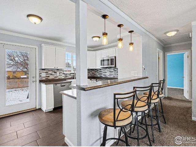 123 S Marjorie Ave, Milliken, CO 80543 | MLS #1057 | Compass