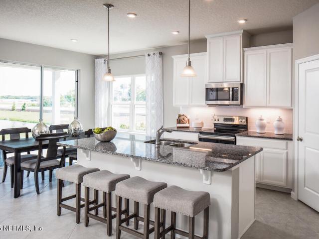 123 Sago Ct, Palm Coast, FL 32164 | MLS #2128 | Compass