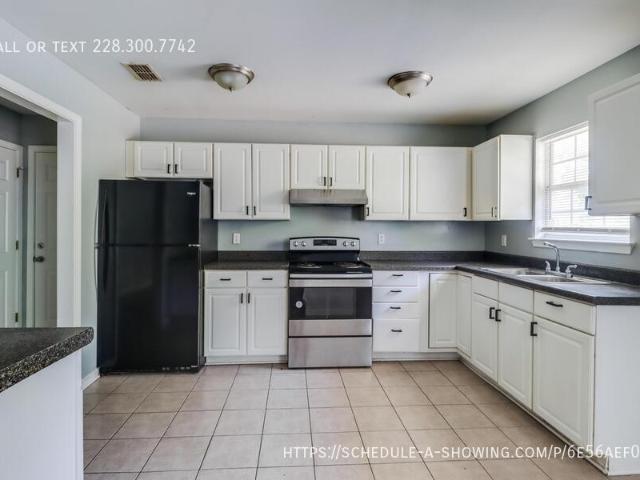 124 30th 1/2 St, 2 beds, 1 full and 1 half bath
