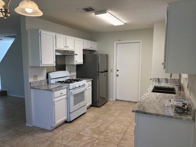 12715 Modena Trail, Austin, TX 78729 | MLS #7239 | Compass