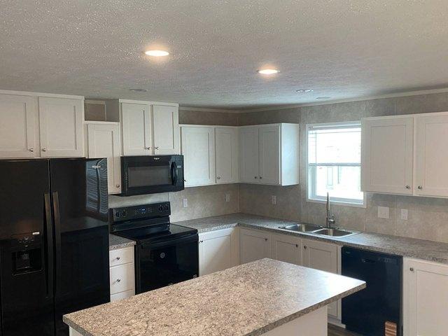 128 W 8th St, Coal Valley, IL 61240
