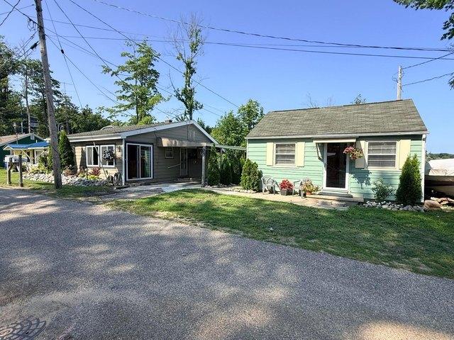 129 Tin Pan Aly, Houghton Lake, MI 48629