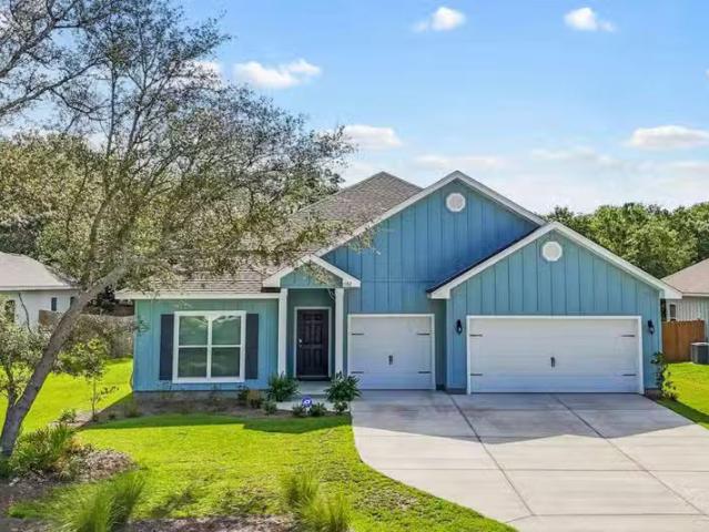 1302 HOLLAND ST, GULF SHORES, AL 36542 Single Family Residence.