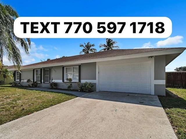 1314 Woodcrest Rd S, West Palm Beach, FL 33417