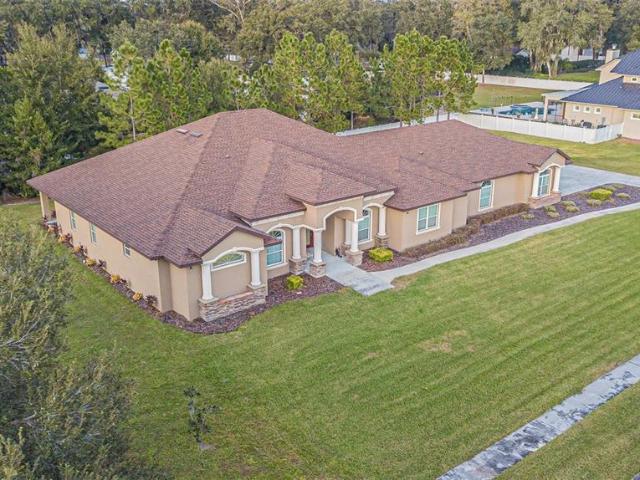 13102 Done Groven Dr, Dover, FL 33527 | MLS #TB8429 | Compass