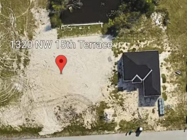 1320 NW 15TH TER, CAPE CORAL, FL 33993 Single Family Residence.