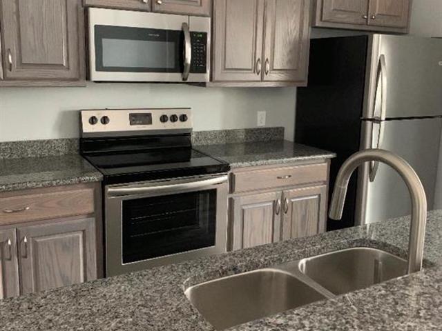 133 W Britton # 202