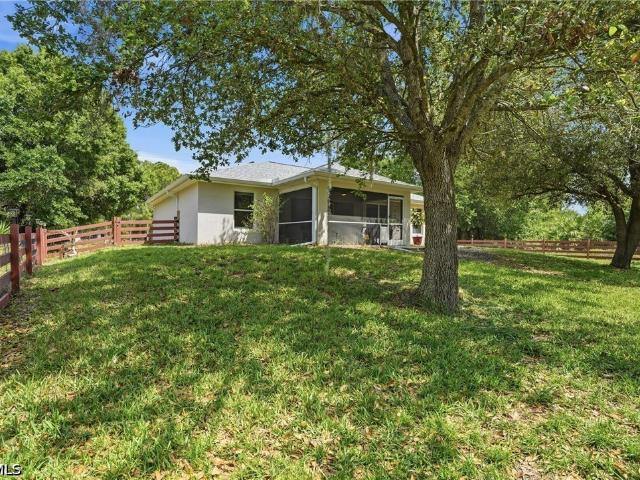 134 McArthur Blvd, Lehigh Acres, FL 33974 | MLS #2026013 | Compass