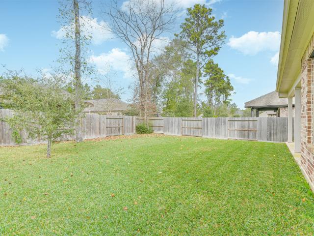 135 Winged Elm Ct, Willis, TX 77318 | MLS #80146