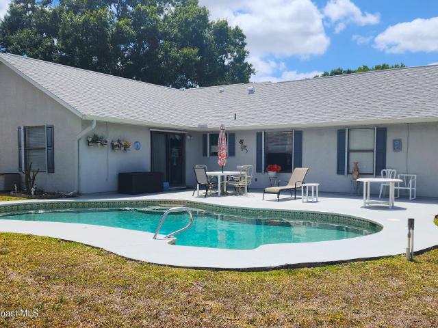 1381 Mann Ave NW, Palm Bay, FL 32907 | MLS #1044 | Compass