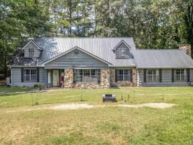 13986 TABOR RD, COLLINSVILLE, AL 35961 Single Family Residence.