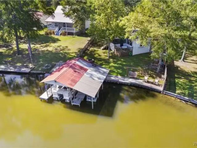 1398 WHITE OAK RD, SYLACAUGA, AL 35151 Single Family Residence.