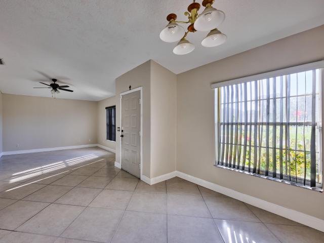 1407 SE Grapeland Ave, Port St. Lucie, FL 34952 | MLS #R11146