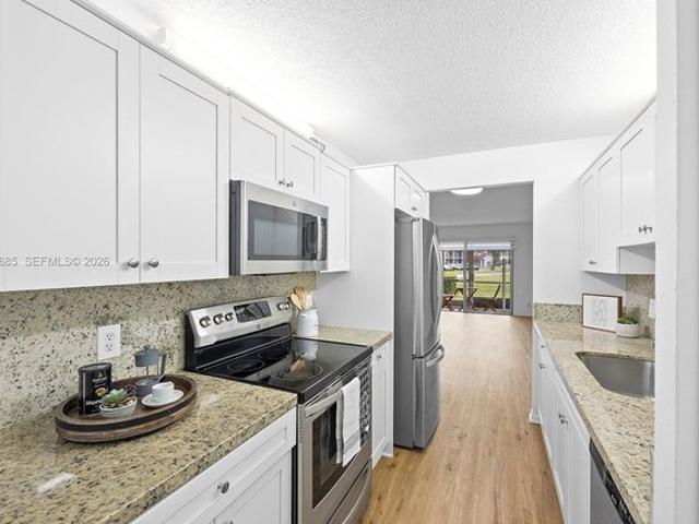 1401 SW 128th Ter Unit 103H, Pembroke Pines, FL 33027