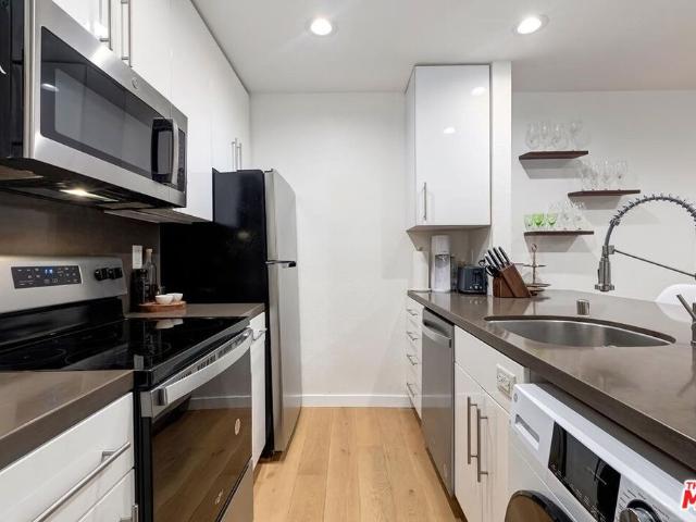 141 S Clark Drive 208