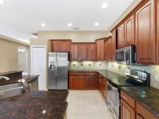1450 Warrington Way, Trinity, FL 34655 | MLS #W7883