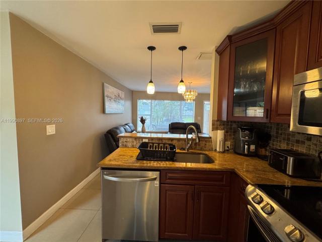 1460 NE 30th Ct, Pompano Beach, FL 33064 | MLS #A11990 | Compass