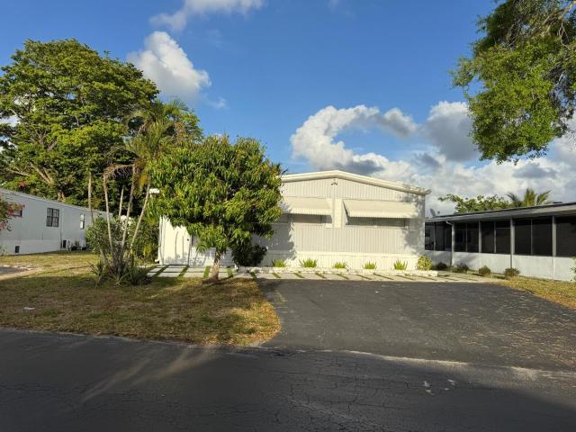 1514 NW 23rd St, Unit 617, Boynton Beach, FL 33436 | MLS #B26010 | Compass