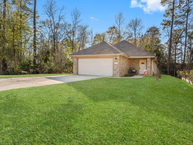 15120 Arrowhead Loop E, Willis, TX 77378 | MLS #34187
