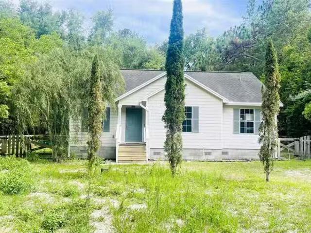 15530 NE 12TH ST, WILLISTON, FL 32696 Single Family Residence.