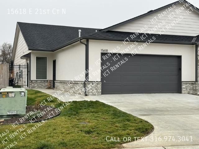 15618 E 21st Ct N, 3 beds, 2 full baths