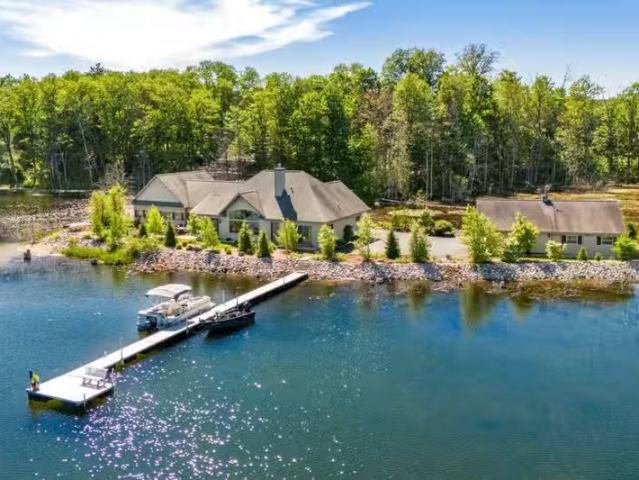 15719 PEARL LAKE DR, EMPIRE, MI 49630 Single Family Residence.