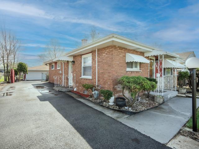 16221 Hermitage Ave, Markham, IL 60428 | MLS #12620 | Compass