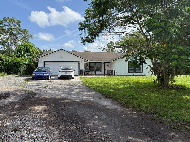 16393 E Lancashire Dr, The Acreage, FL 33470