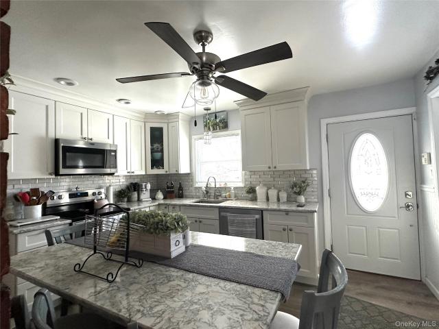 166 Choir Ln E, Westbury, NY 11590 | MLS #956531 | Compass