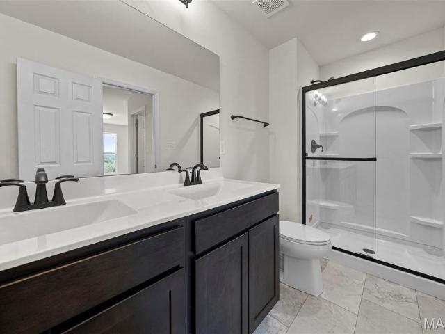 16777 Pebble Stone Dr, Florissant, MO 63031 | MLS #26008 | Compass