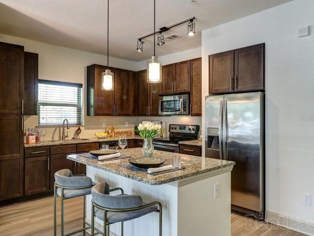 1688 Celebration Blvd, Unit THE SUNSET, Celebration, FL 34747 | MLS #O6403