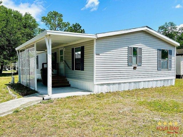 1690 Timber Ridge Cir, Leesburg, FL 34748