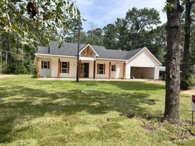 17039 E Hollyhill Dr, Plantersville, TX 77363