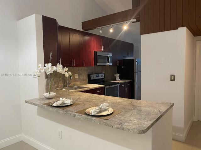 1712 NW 74th Ave, Unit 28, Plantation, FL 33313 | MLS #A11962 | Compass
