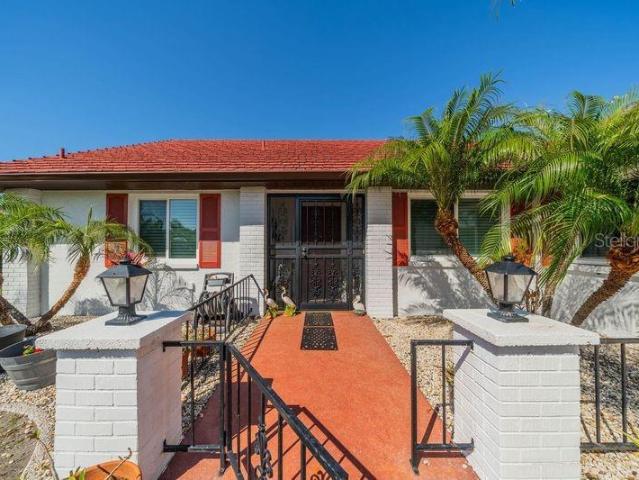 1723 Wolf Laurel Dr, Sun City Center, FL 33573 | MLS #TB8473 | Compass