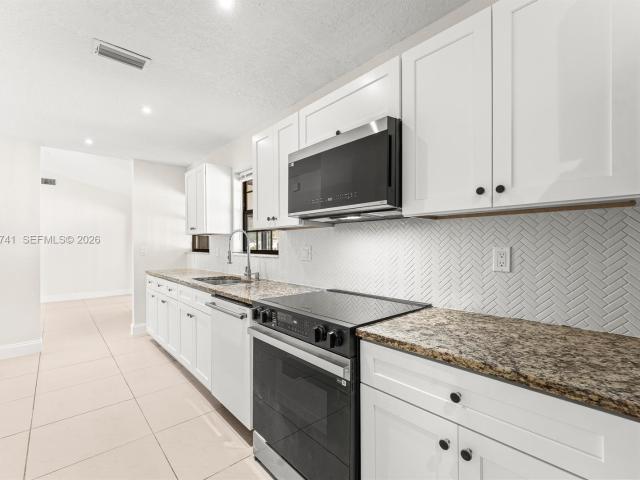 18055 Sycamore Dr W, Unit 1, Loxahatchee, FL 33470 | MLS #A12007
