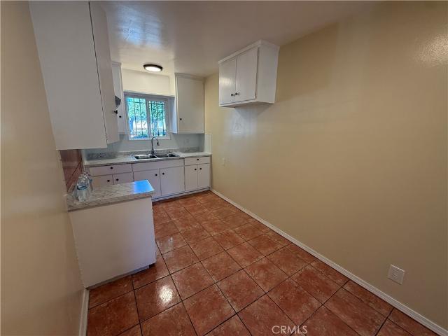 1805 S Rimpau Blvd, Los Angeles, CA 90019 | MLS #SR25221 | Compass
