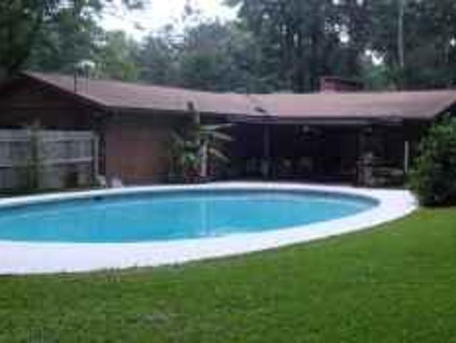 $1800 / 3br Beautiful Pool Home, Hot Tub, Close to UF.84 acre fenced 241 NW 46 Street map