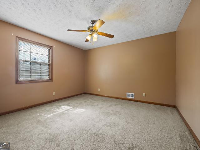 180 Oak Leaf Dr, Stockbridge, GA 30281 | MLS #10780