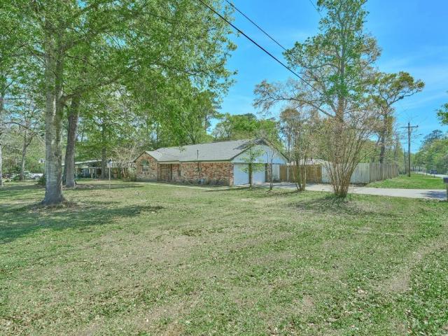 1815 Live Oak Dr, Conroe, TX 77301 | MLS #55482