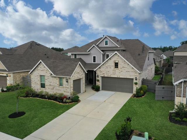 18323 Tiger Flowers Dr, Conroe, TX 77302