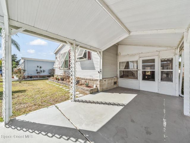 1854 Mango St NE, Palm Bay, FL 32905 | MLS #1069 | Compass