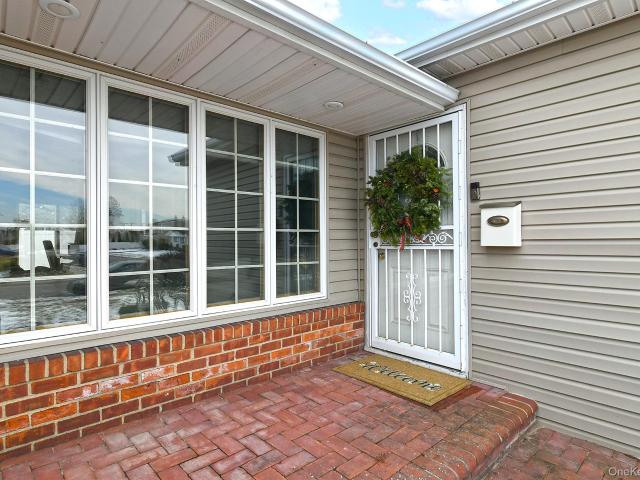 18 Vassar Ln, Hicksville, NY 11801 | Compass