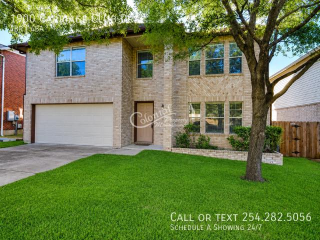 1900 Carriage Club Dr, 4 beds, 3 full and 1 half baths