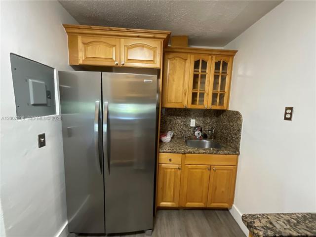 1945 NW 29th St, Unit A8, Miami, FL 33142 | MLS #A12007 | Compass